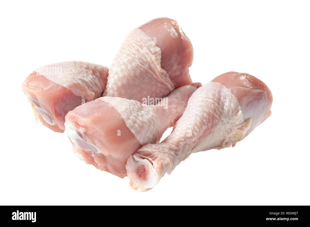raw chicken legs isolated on white background Stock Photo - Alamy