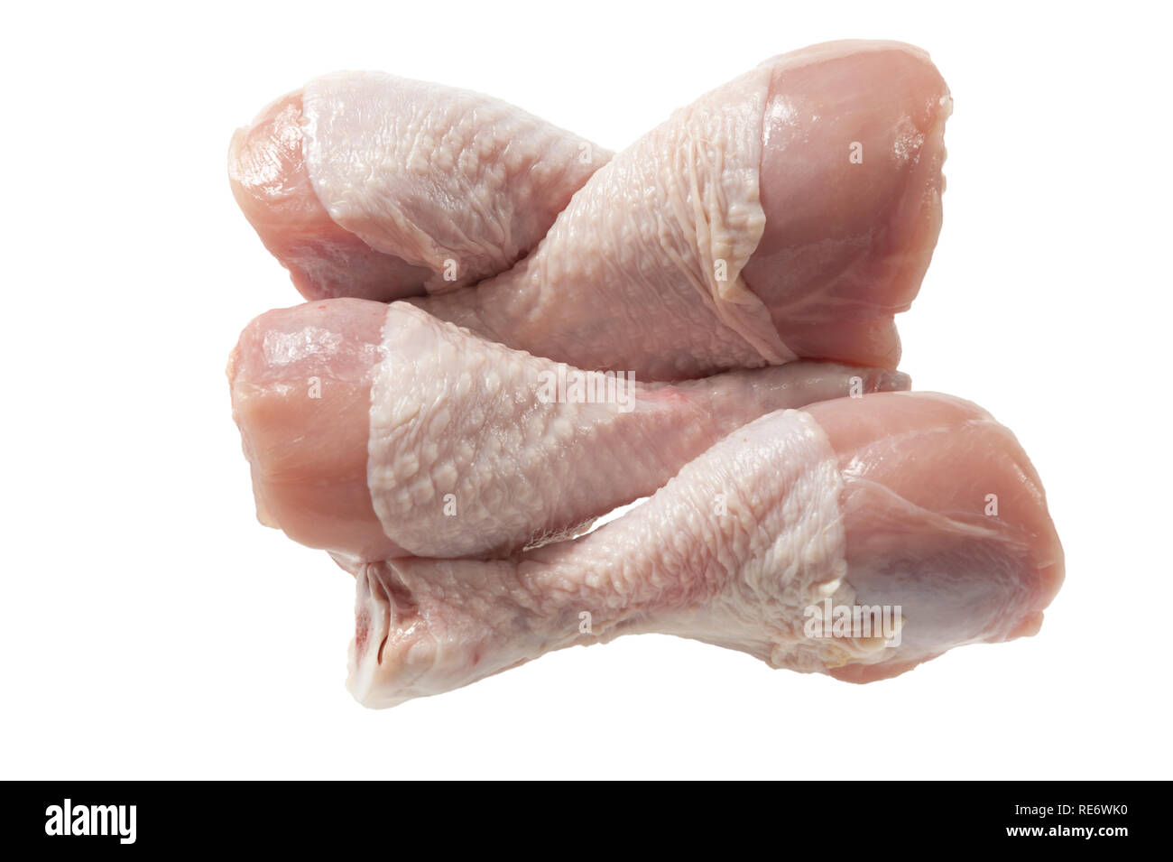 raw chicken legs isolated on white background Stock Photo - Alamy
