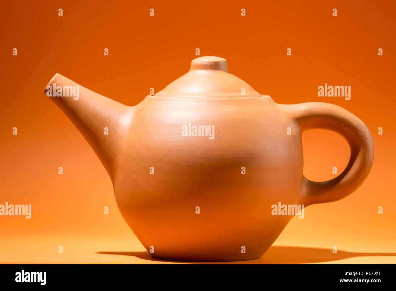 Red teapot placed on hi-res stock photography and images - Alamy