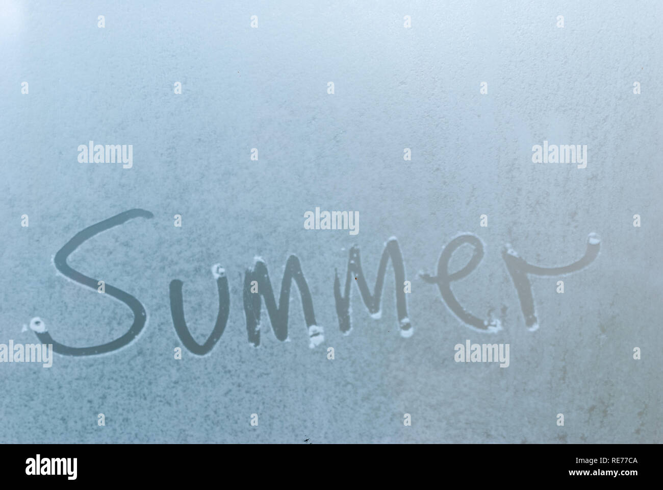"Summer" written in the ice on a frozen window Stock Photo - Alamy