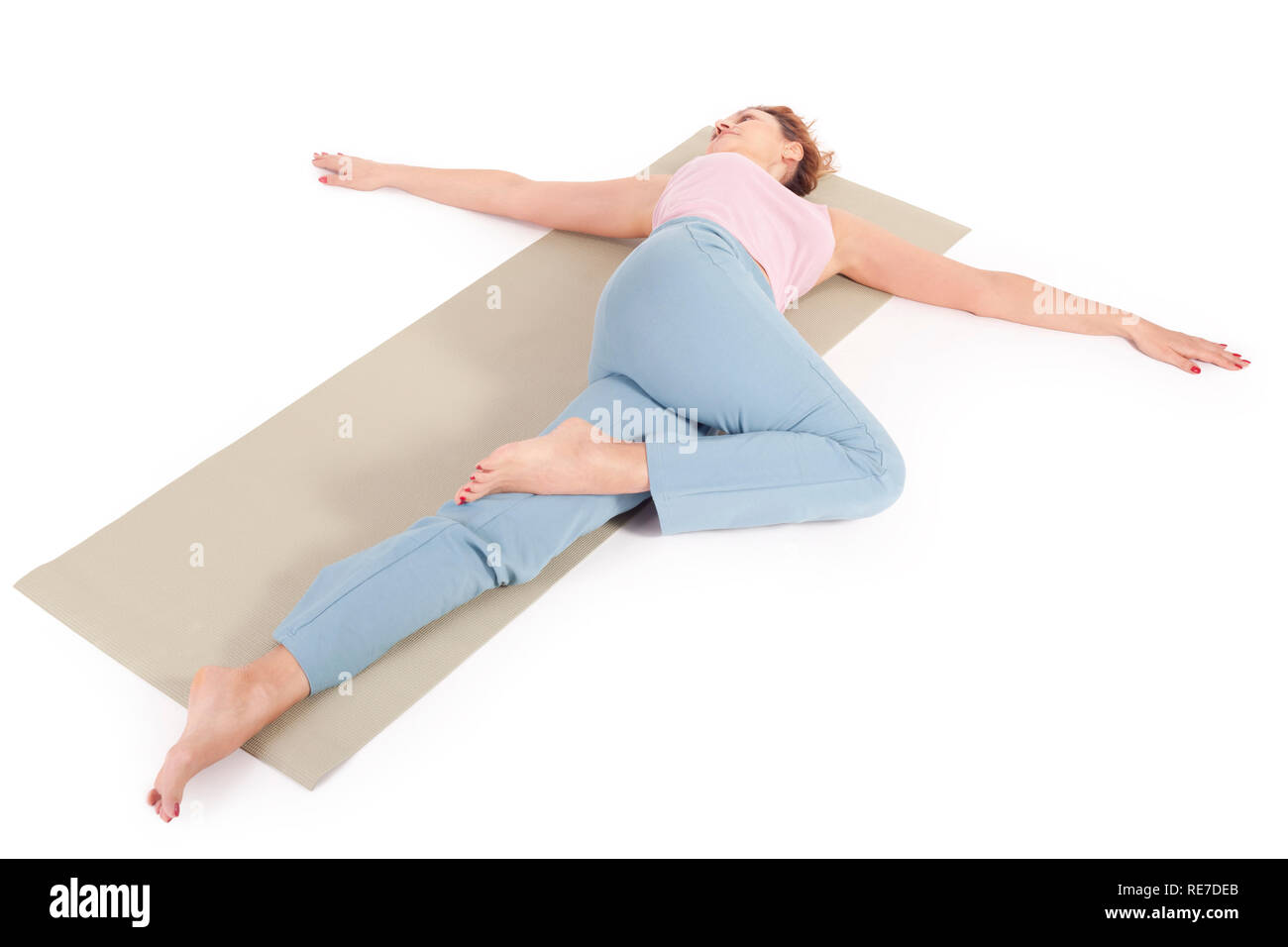 Reclined spinal twist pose hi-res stock photography and images - Alamy