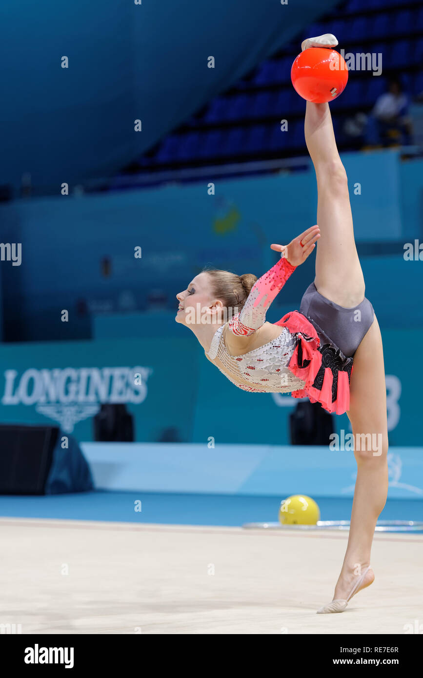 Kiev, Ukraine - August 28, 2013: Unidentified female athlete performs ...