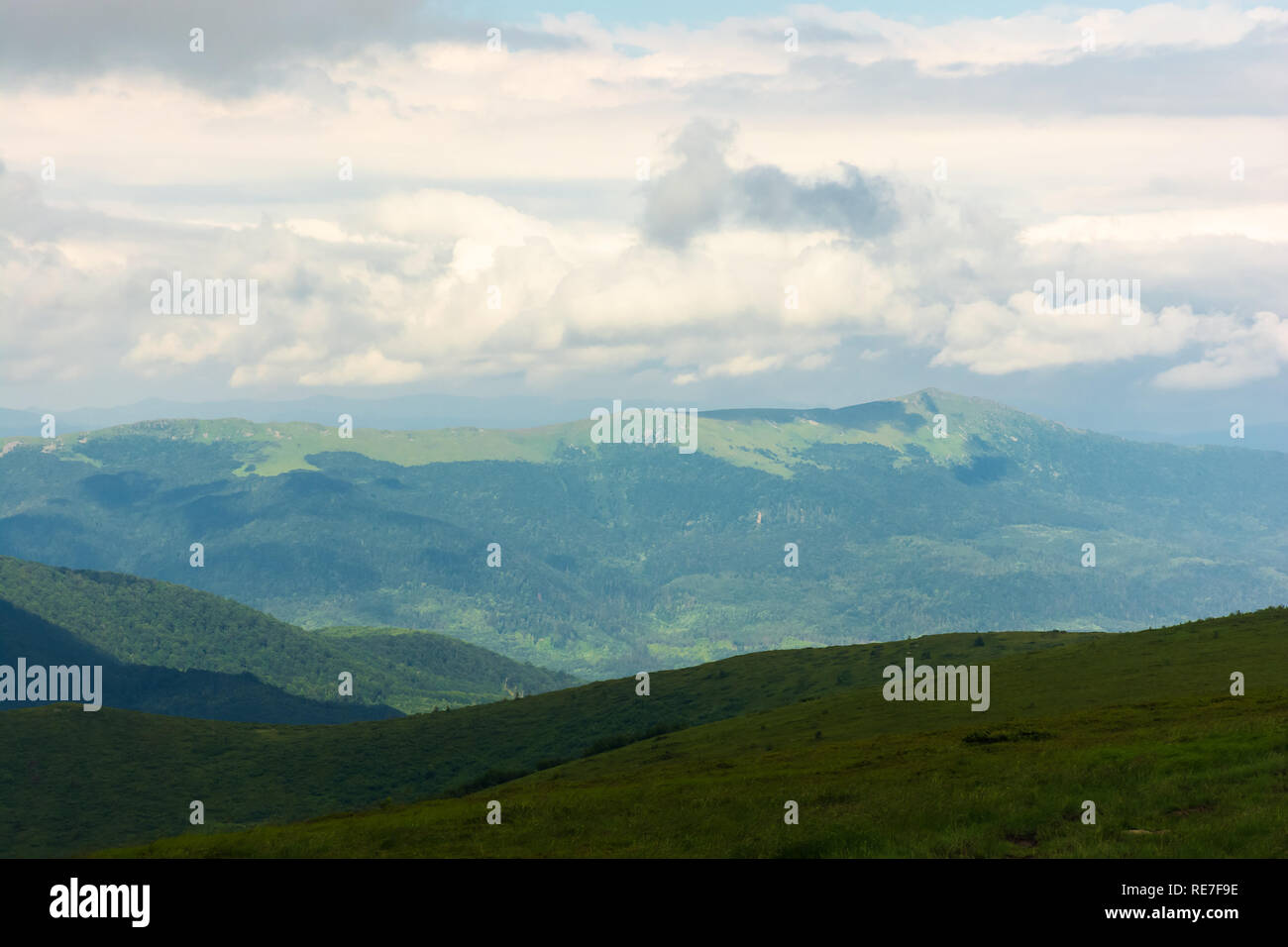 distant mountain ridge in clouds. beautiful summer landscape with ...