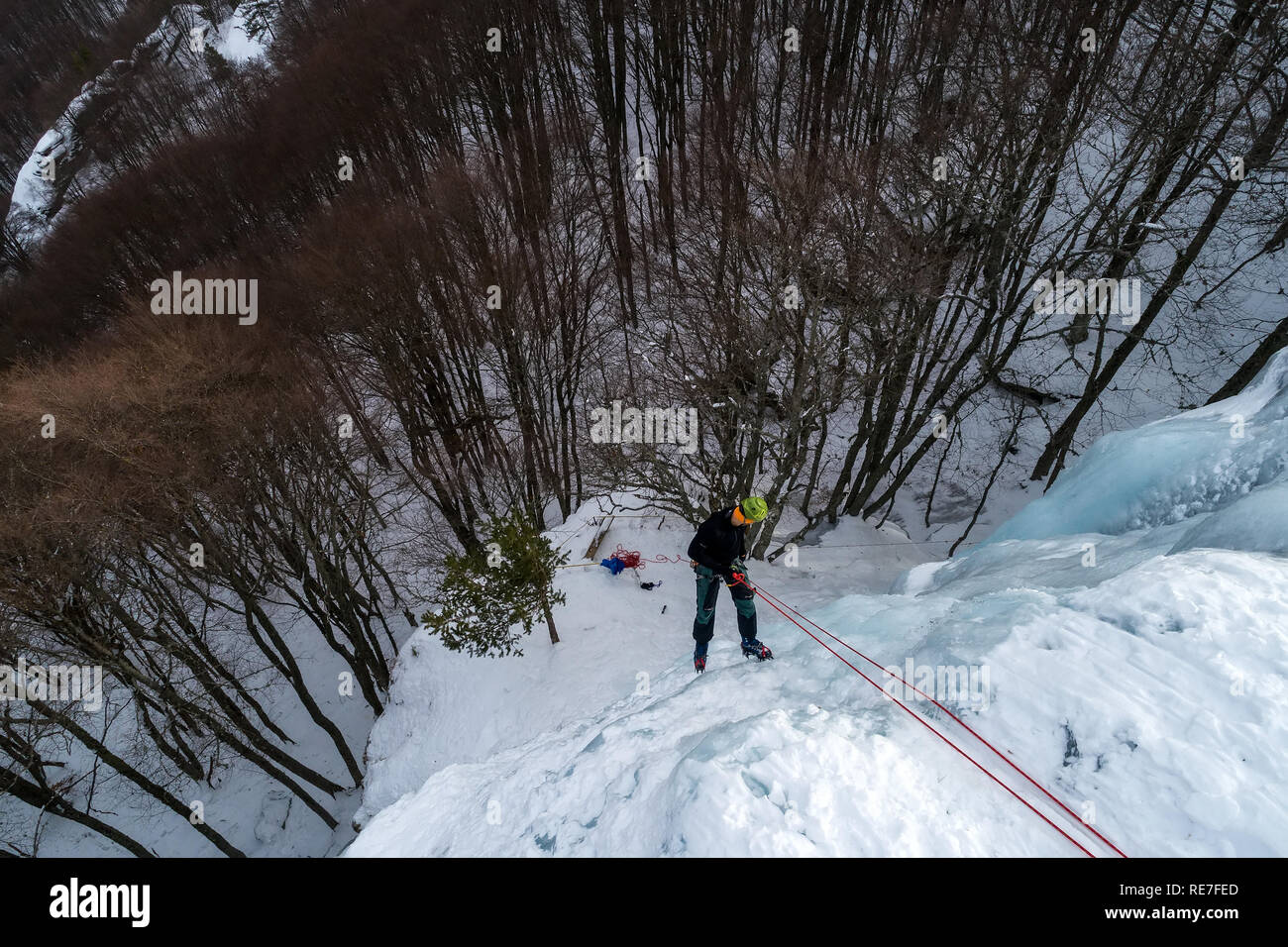 Ice climbing the North Greece, man climbing frozen waterfall Stock ...