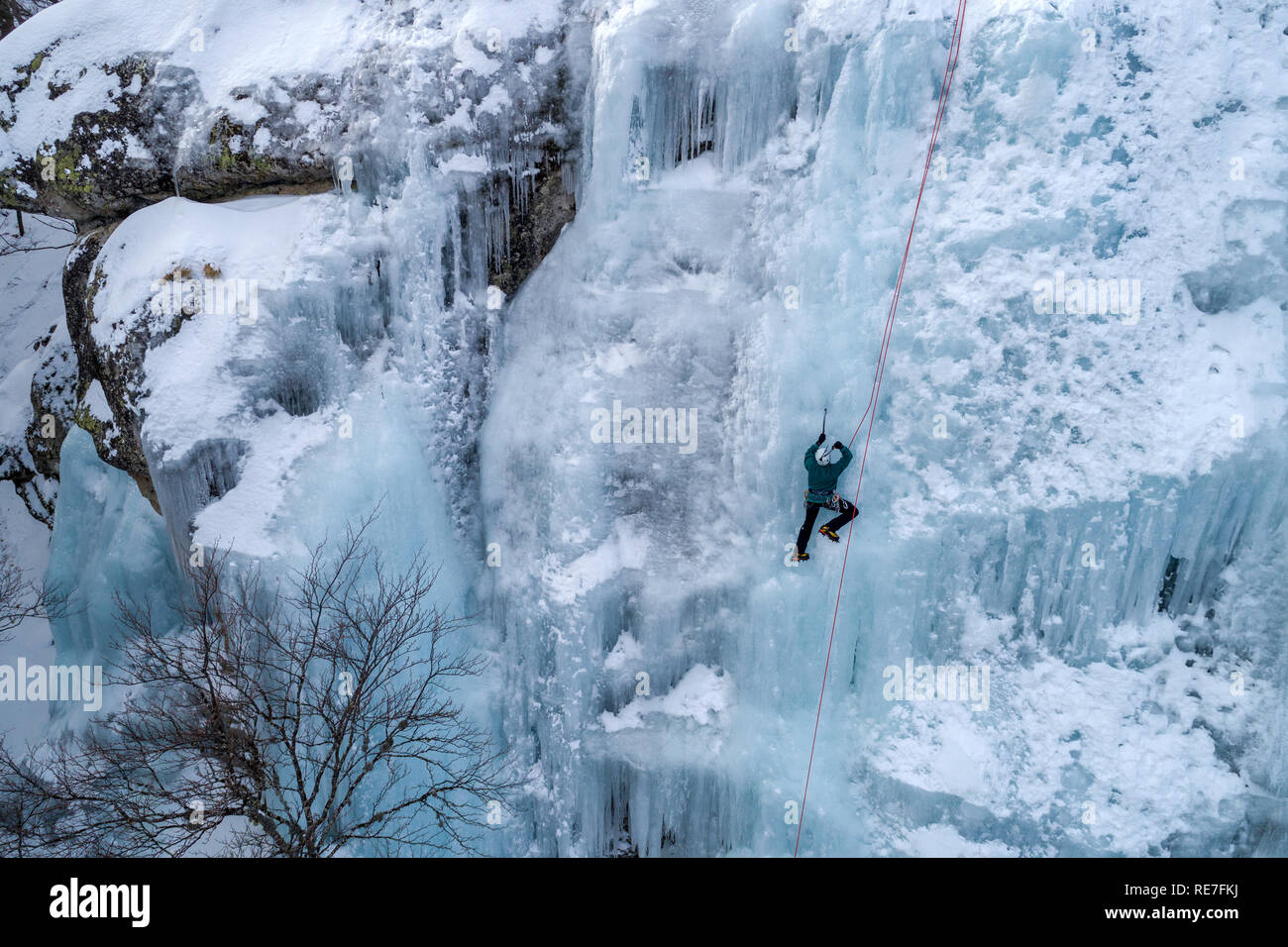 Ice climbing the North Greece, man climbing frozen waterfall Stock ...