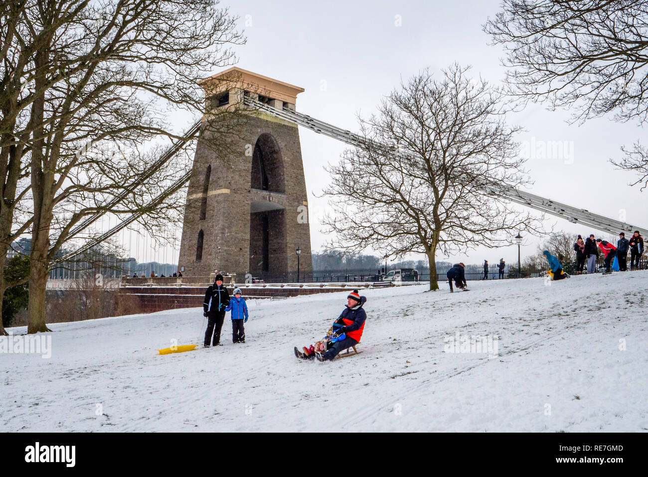 Families enjoying the opportunity of winter snow to sledge down Sion ...