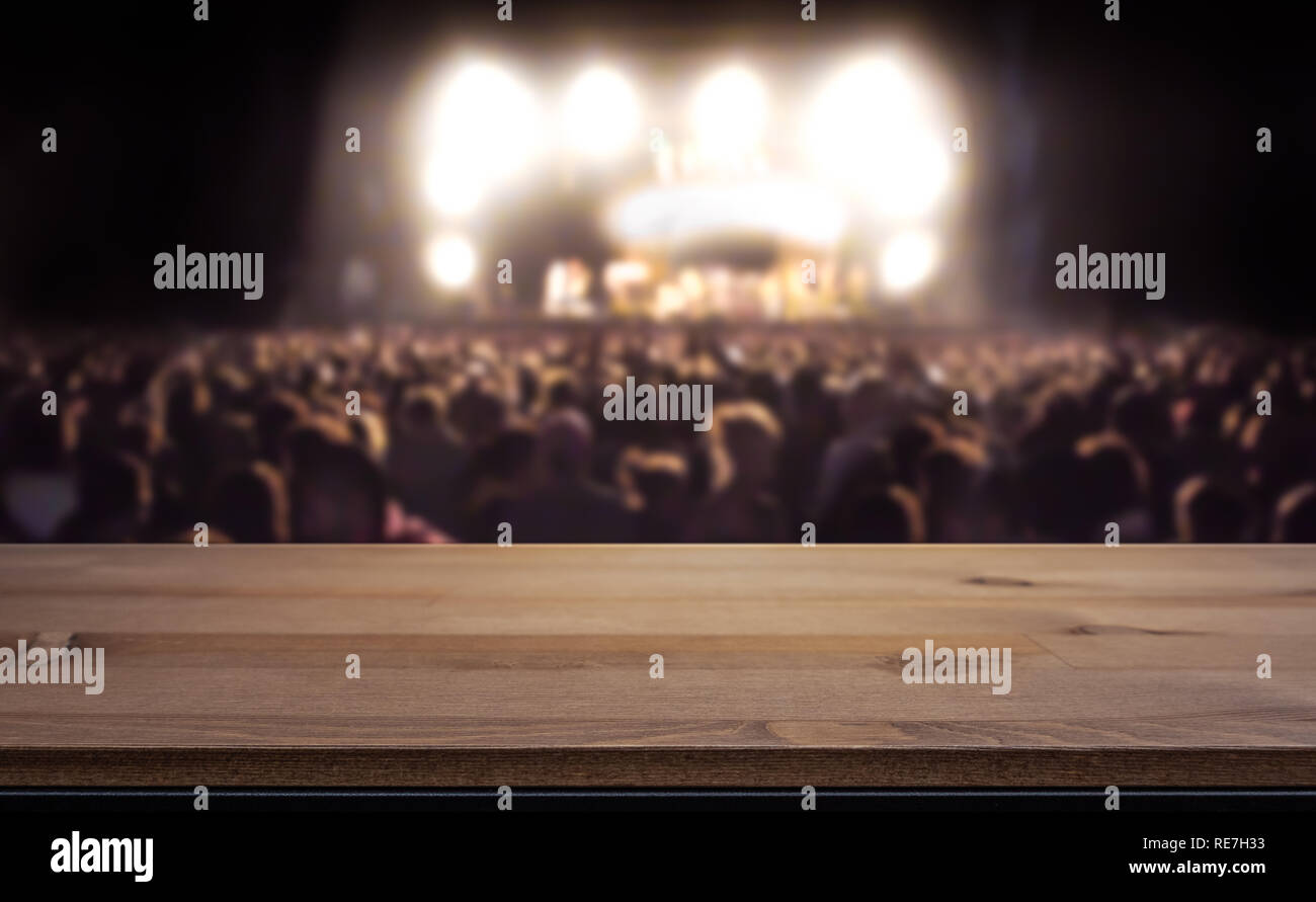 Empty table top for product display montage. Crowd at concert, summer ...