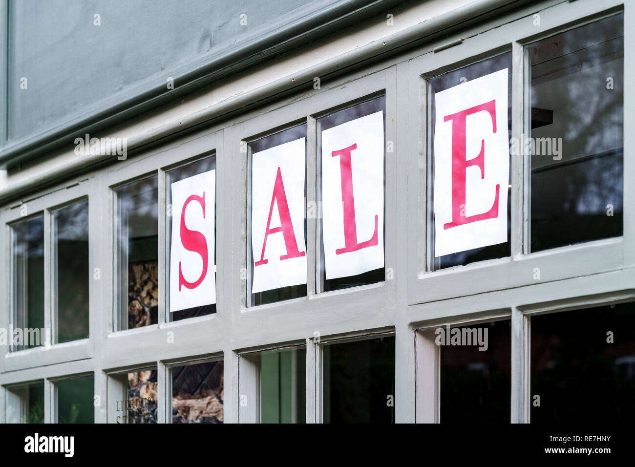 Windows with advertising hi-res stock photography and images - Alamy
