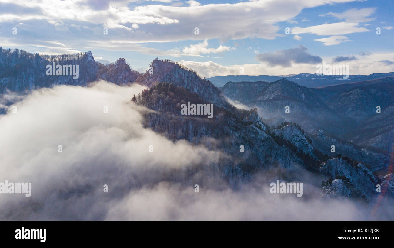 Creamy fog covered the famous rock in morning light Stock Photo - Alamy