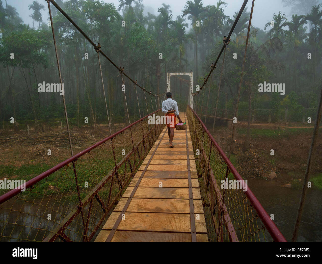 Chikmagalur, India- December 21, 2018 : South indian man walking in a ...
