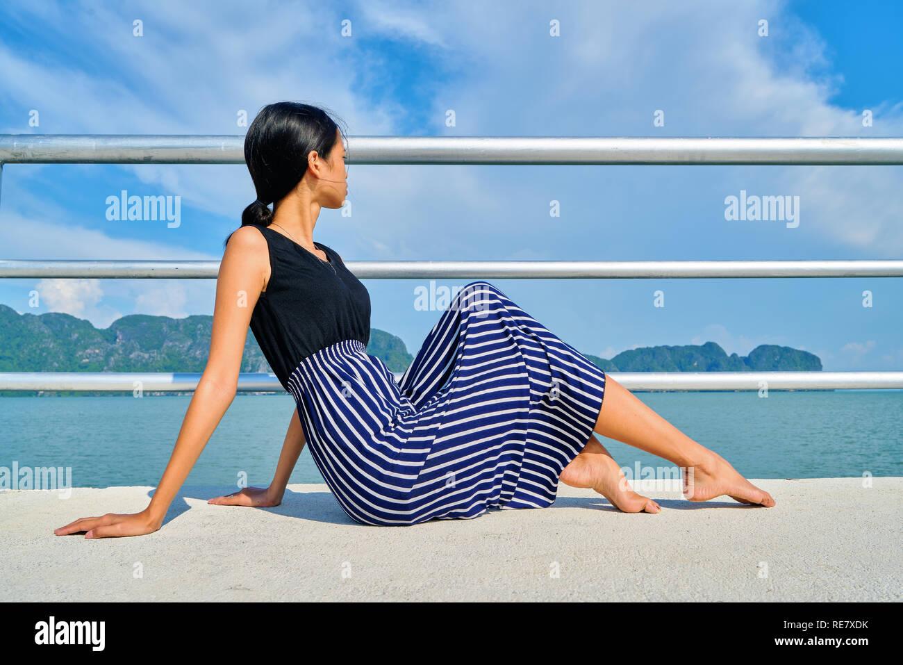 Beautiful woman posing - looking far far away Stock Photo - Alamy