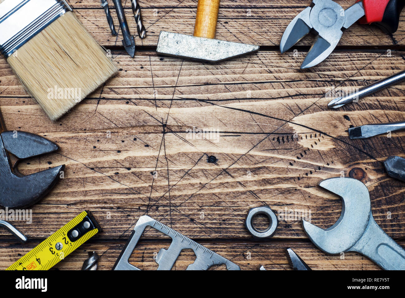 Set of different repair tools on wooden background with copy space ...