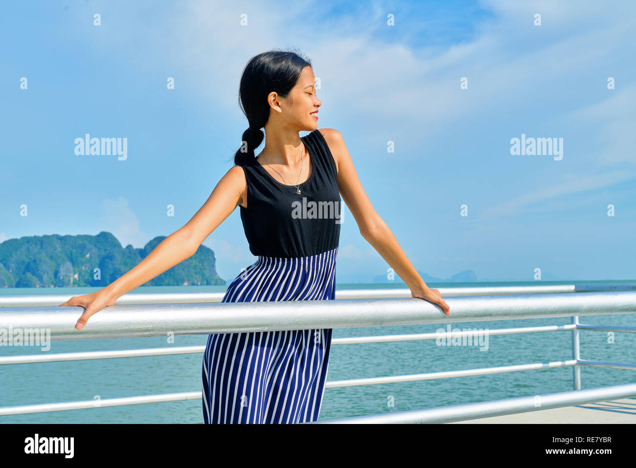 Beautiful woman posing - refreshing and relaxing Stock Photo - Alamy
