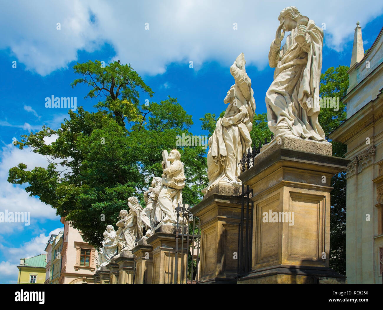 Statues outside the Saints Peter and Paul Church in Krakow, Poland ...