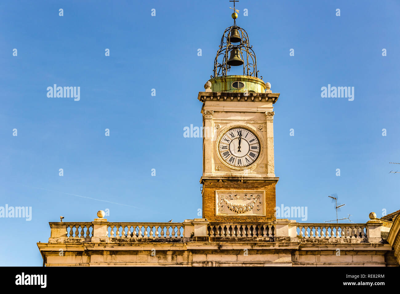 noon on ancient clock tower Stock Photo - Alamy