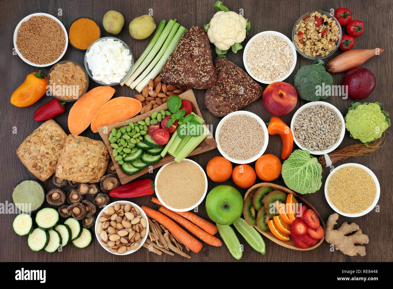 Health food for vegans with grains, seeds, nuts, peanut butter, almond ...
