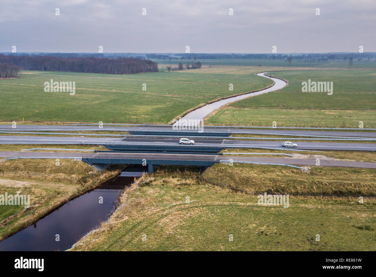 Ecological bridge over natural river with underpass for large animals ...