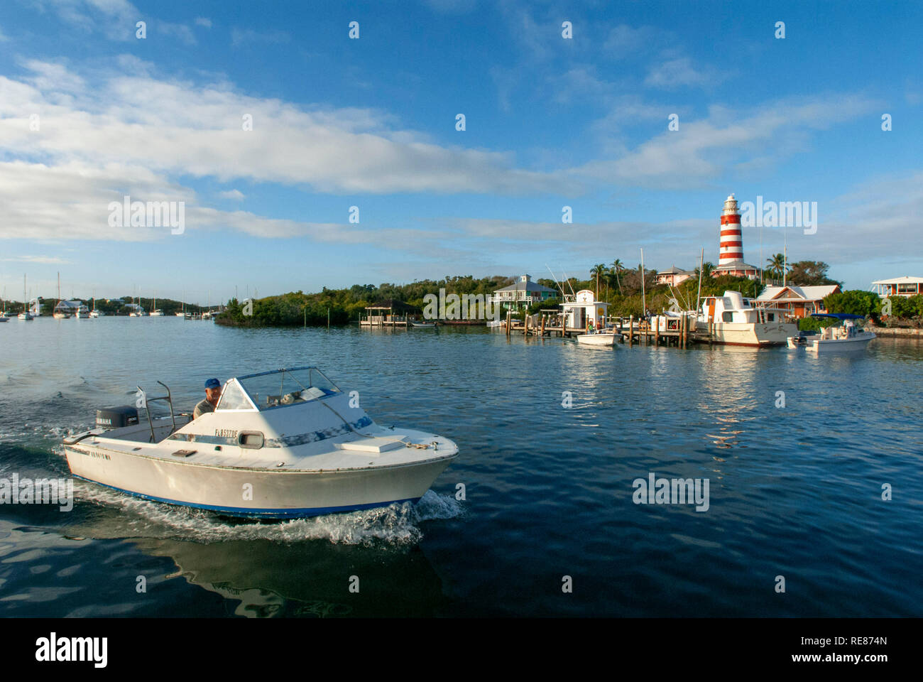 Hope Town lighthouse, Elbow Cay, Abacos. Bahamas. Lighthouse and harbor ...