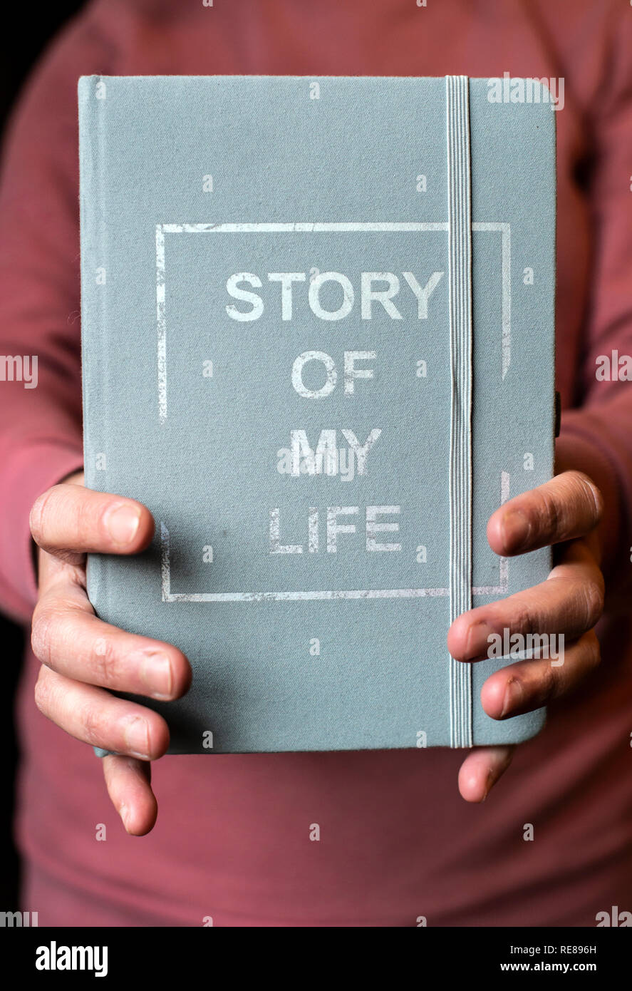 Woman hold notebook. Book notes for the Story of my life. Personal ...