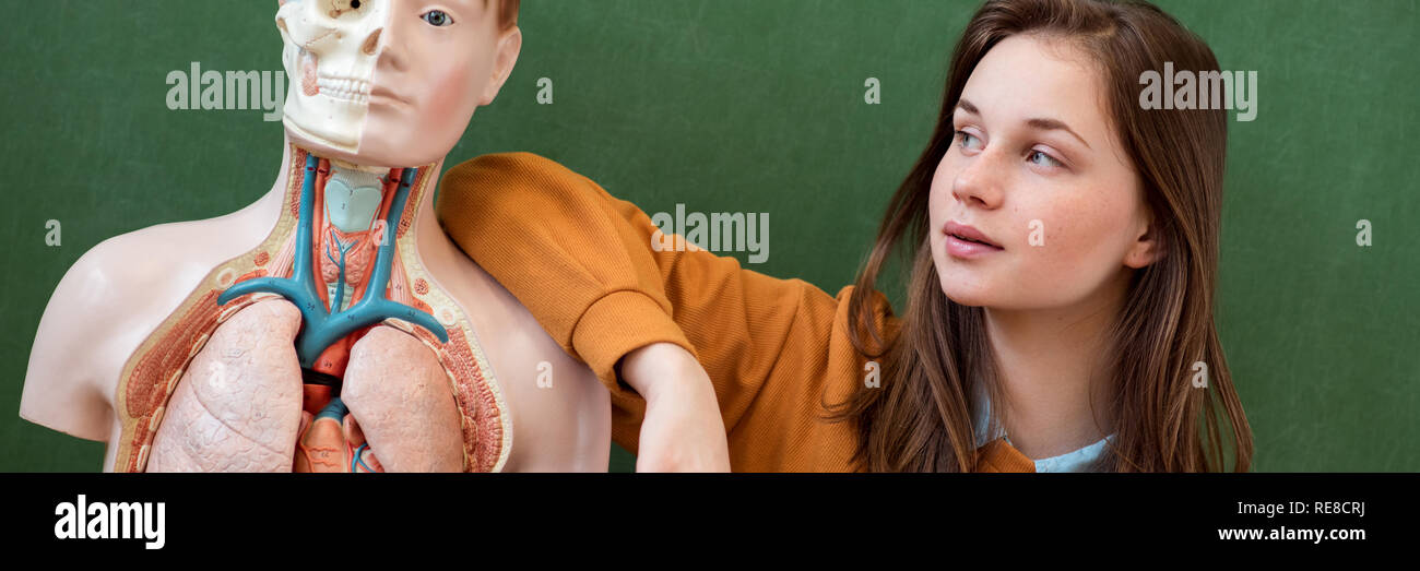 Cool female high school student portrait with an artificial human body ...
