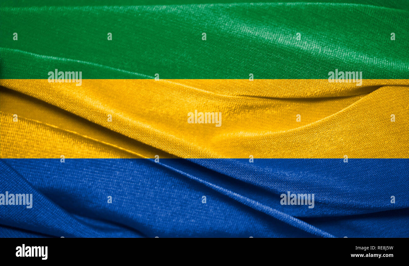 Realistic flag of Gabon on the wavy surface of fabric. Perfect for ...