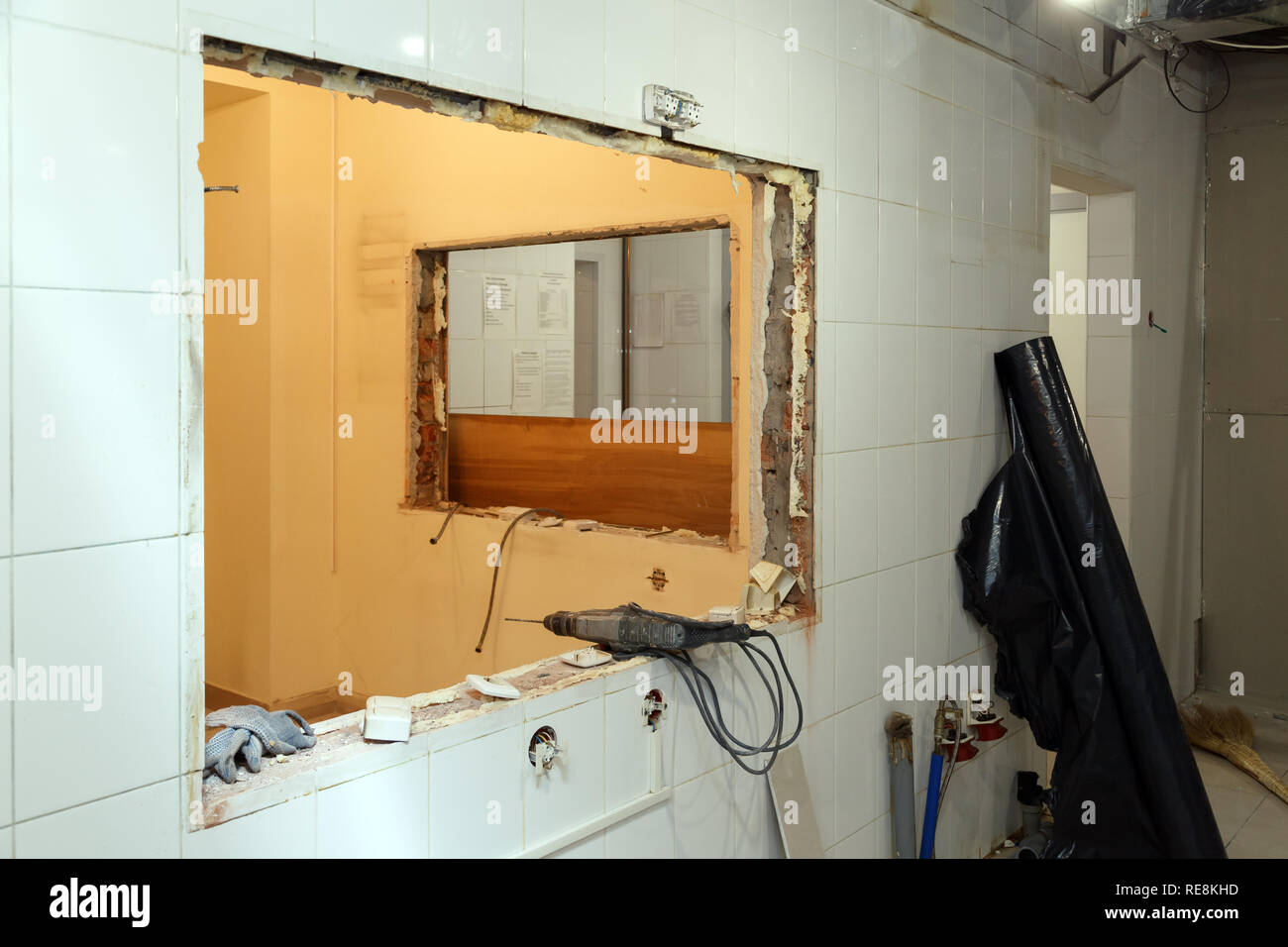 Repair and replacement windows in office building, destroyed window ...