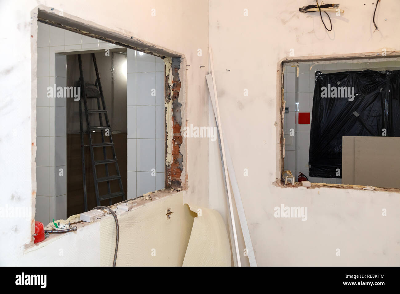Repair and replacement windows in office building, destroyed window ...