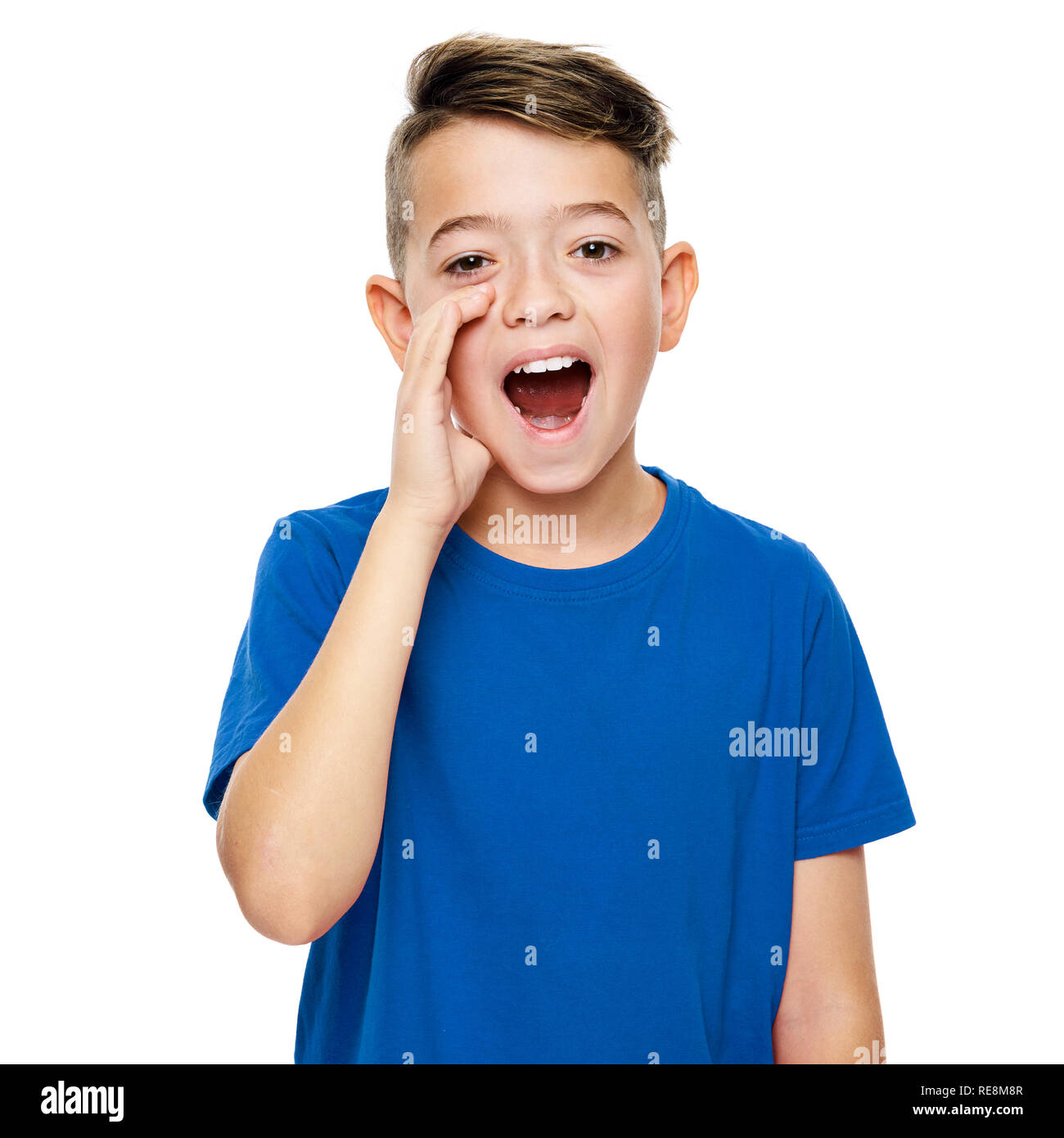 Cute boy in blue T-shirt shouting. Speech therapy concept over white ...