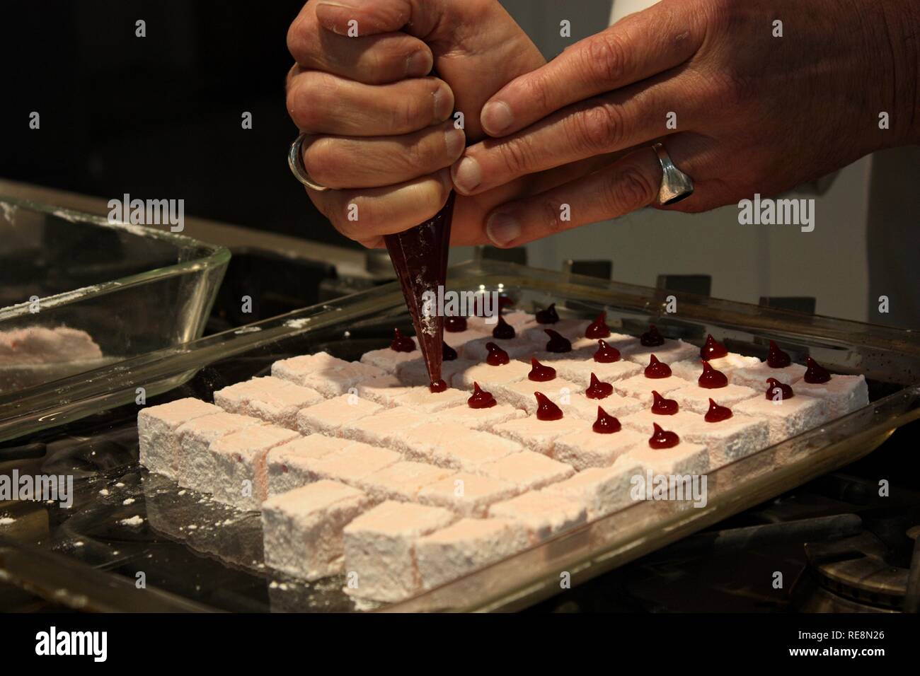 Chef at work making sweets Stock Photo - Alamy