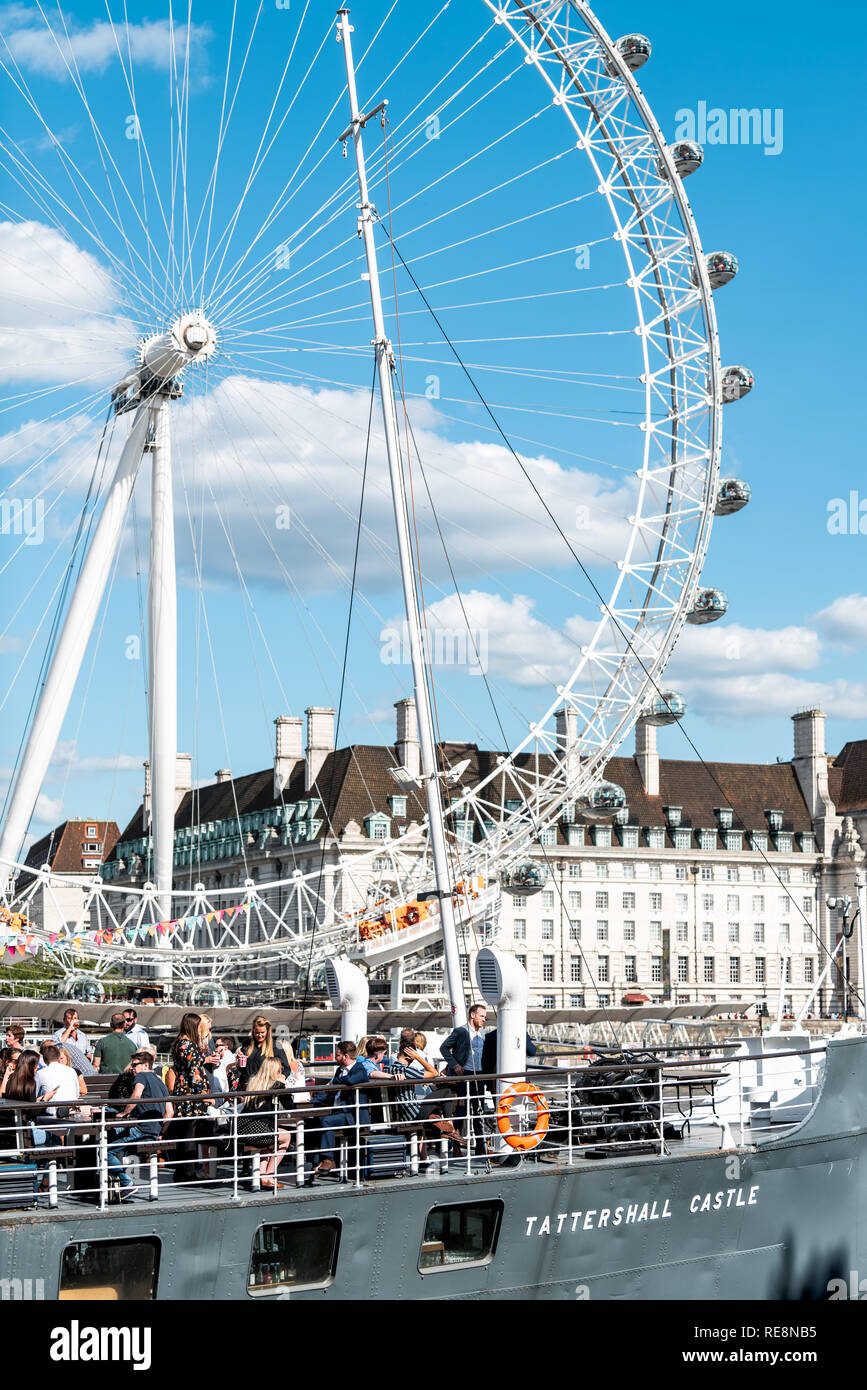 London, UK - June 21, 2018: Many people tourists sitting in boat ship ...