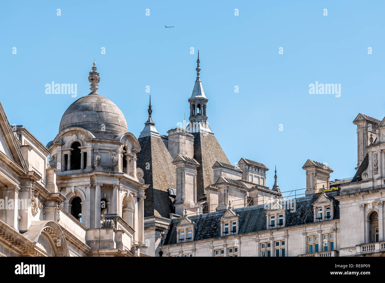 London UK city with closeup view of One Whitehall Place roof old dome ...