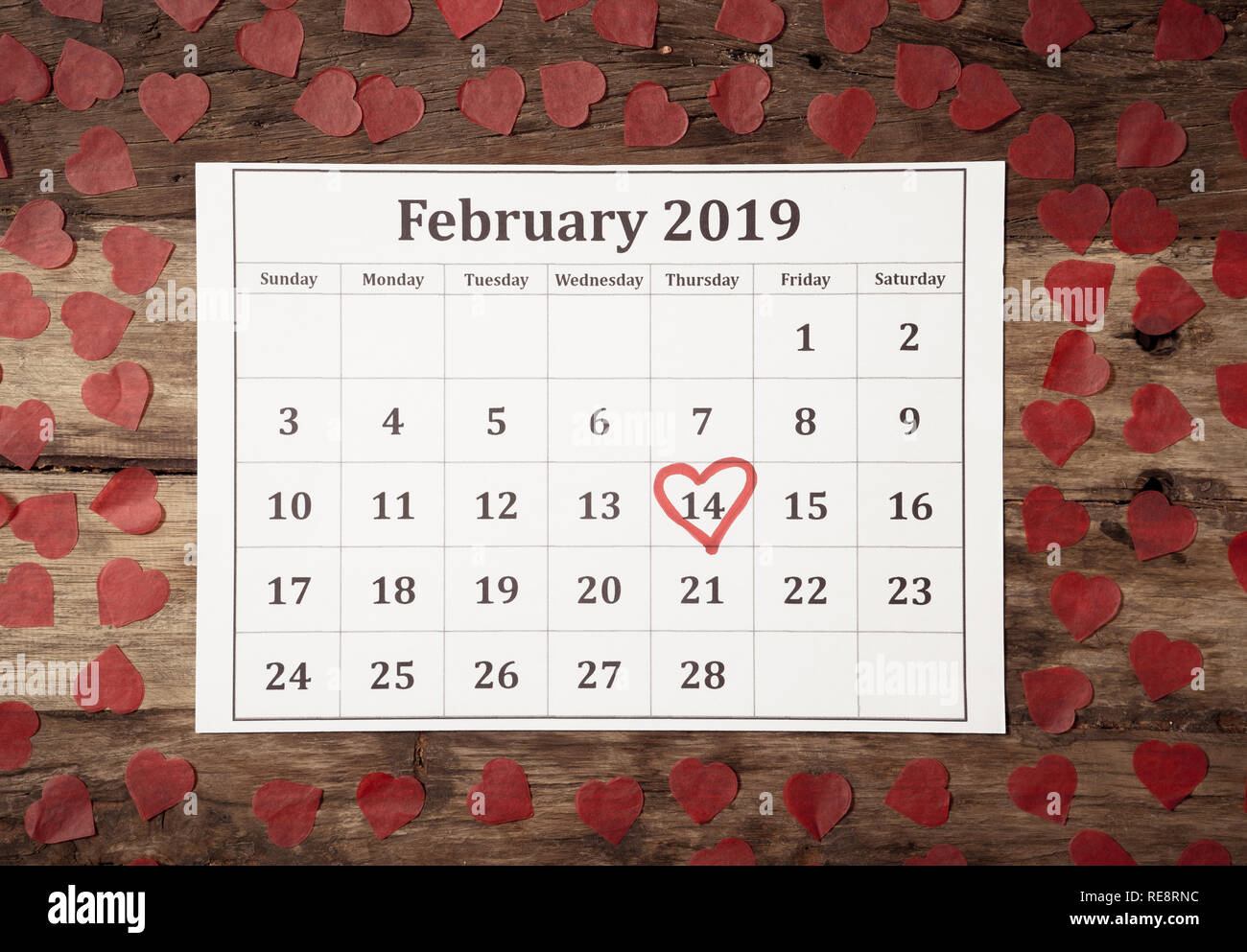 Calendar page with red heart on February 14 th of Saint Valentines day ...