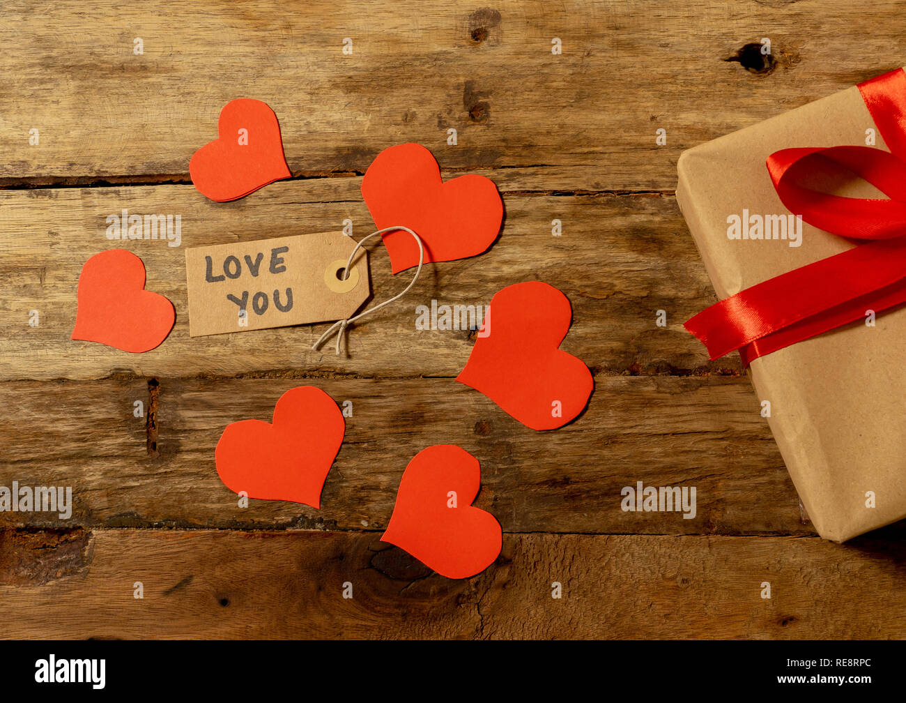 Present gift, red hearts and Love you message on wooden vintage ...