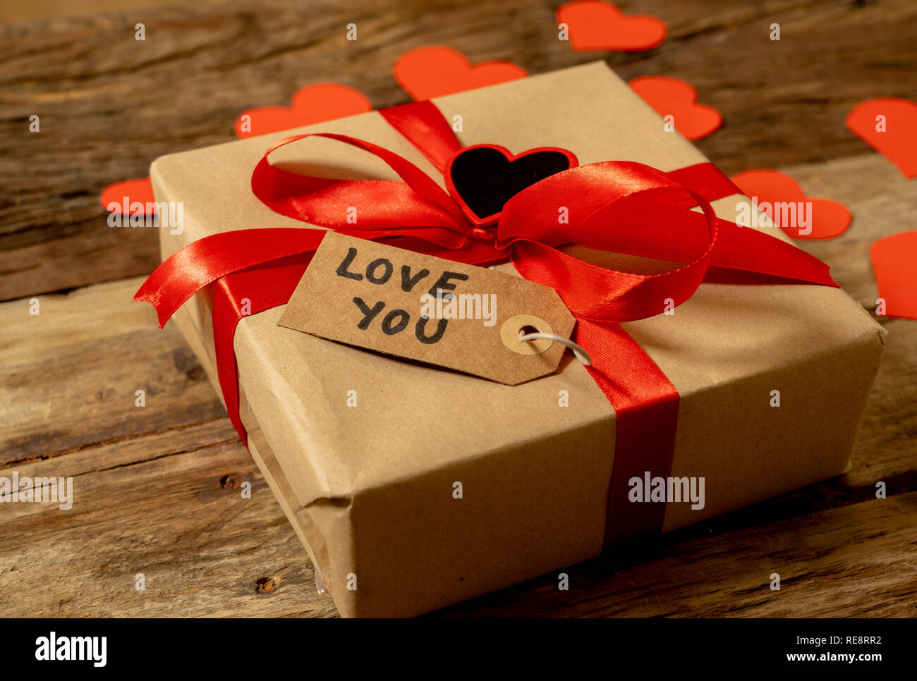 Present gift, red hearts and Love you message on wooden vintage ...