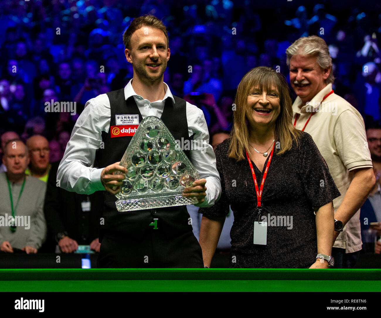 Judd Trump celebrates with the Paul Hunter trophy with his family ...