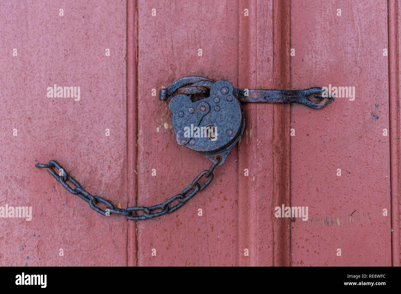 An antique colonial style padlock Stock Photo - Alamy