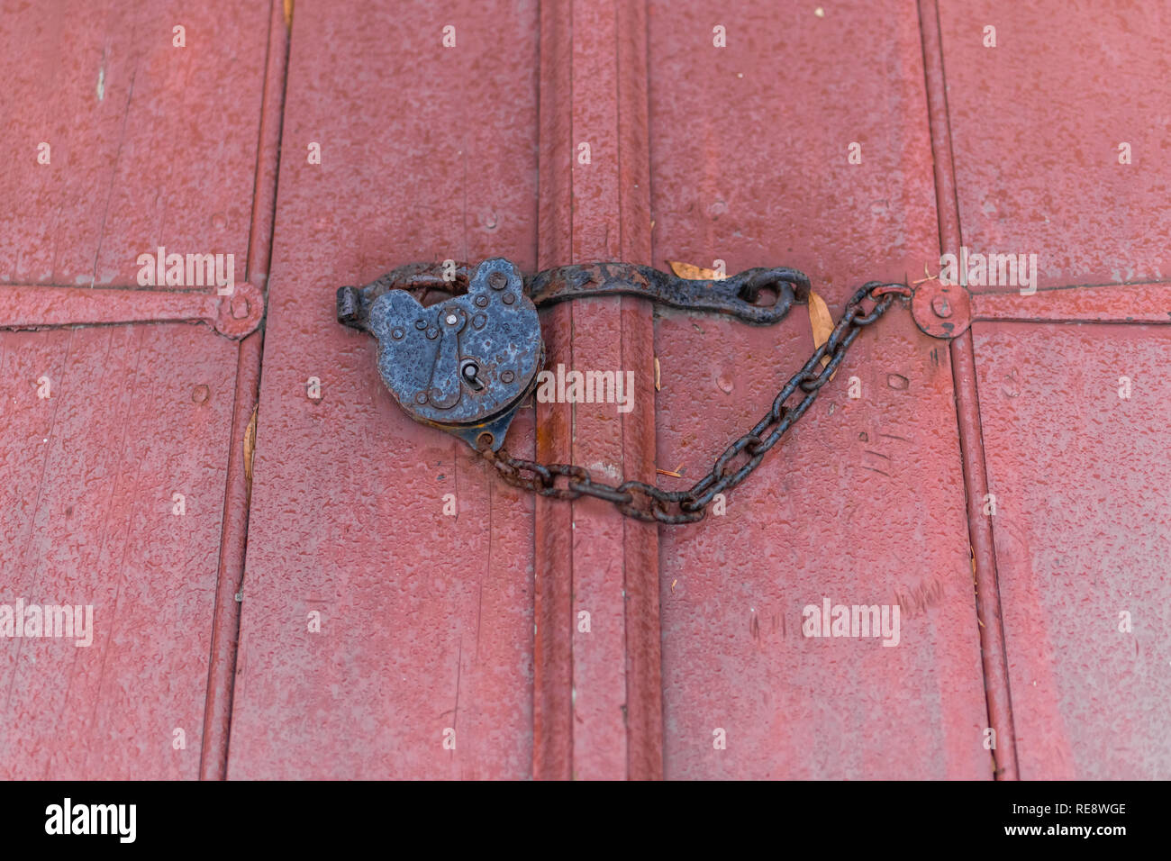 An antique colonial style padlock Stock Photo - Alamy