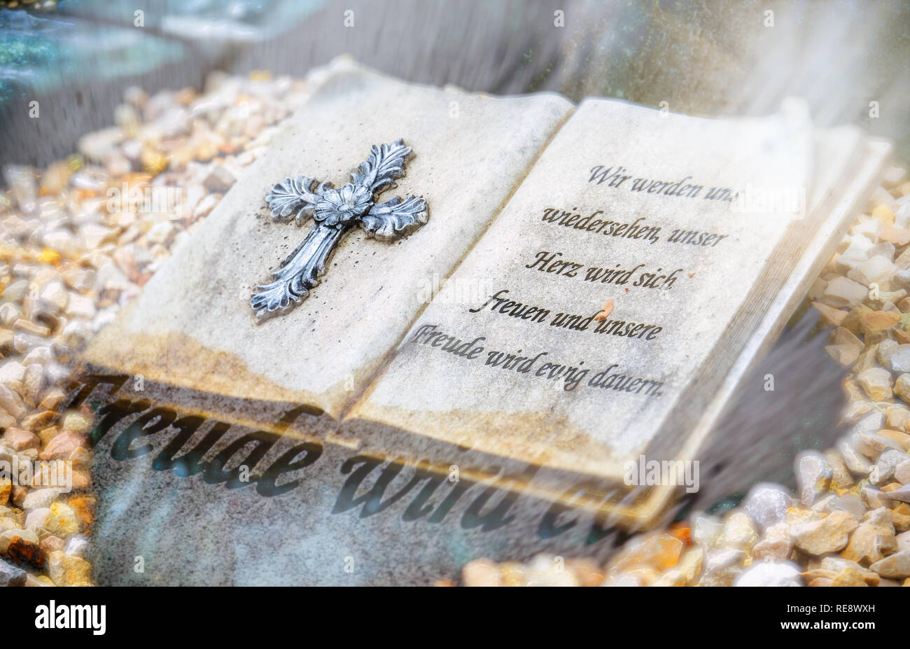 Memorial stone, Book with words of consolation and cross Stock Photo ...