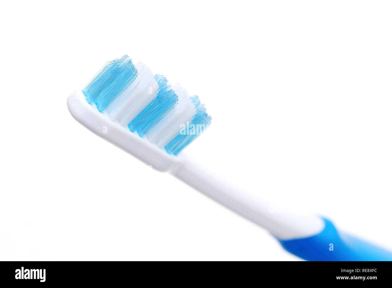 Blue toothbrush isolated on a white background Stock Photo - Alamy