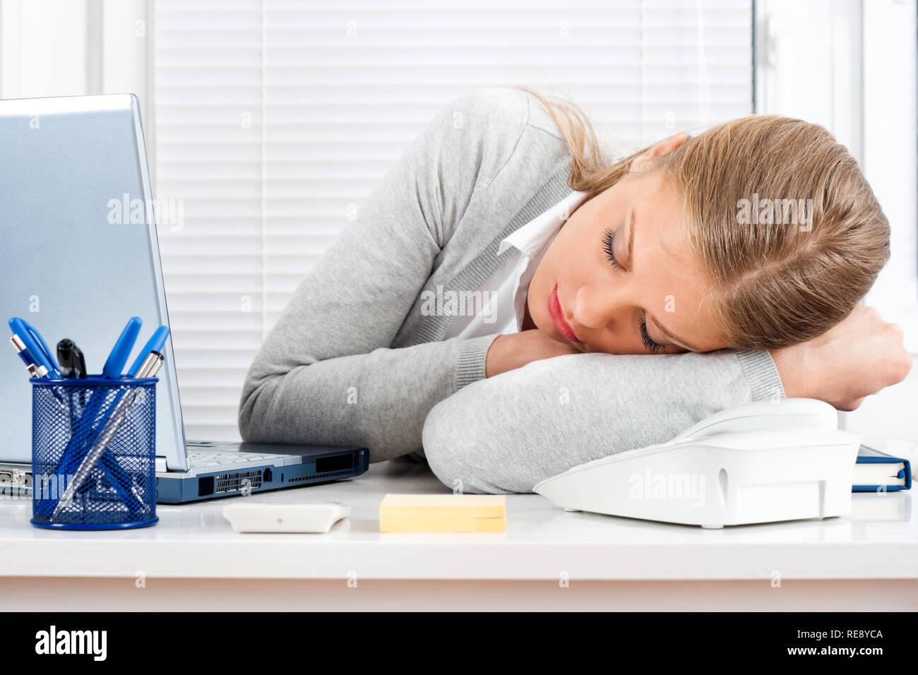 Tired businesswoman sleeping closed hi-res stock photography and images - Alamy