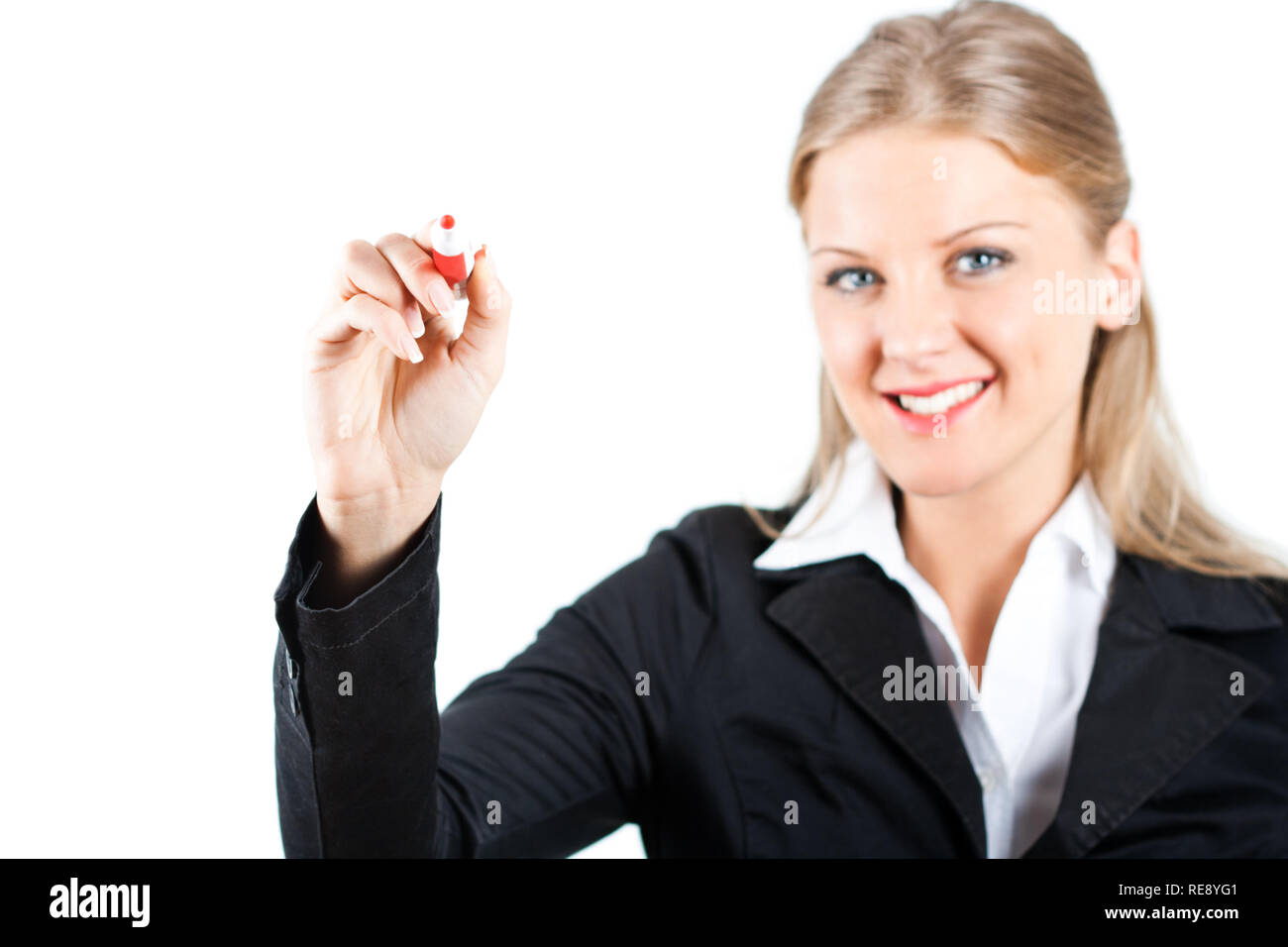 Businesswoman writing with marker Stock Photo - Alamy