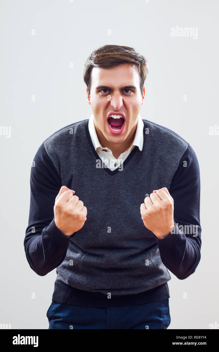 Angry businessman shouting Stock Photo - Alamy