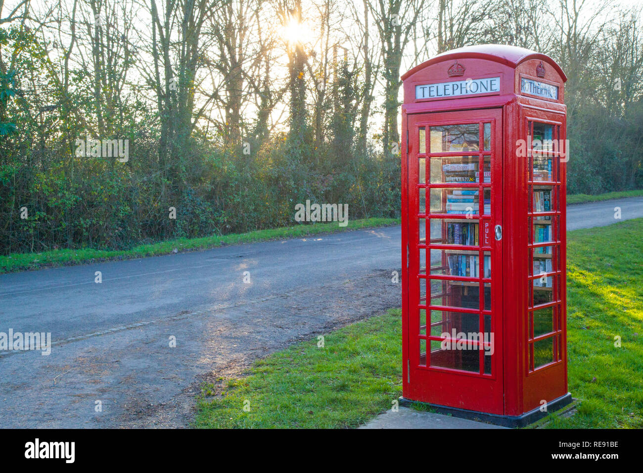 Traditional english red telephone box in a countryside village in ...