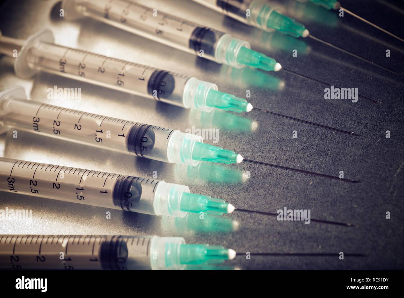 Close-up of a group of syringes Stock Photo - Alamy