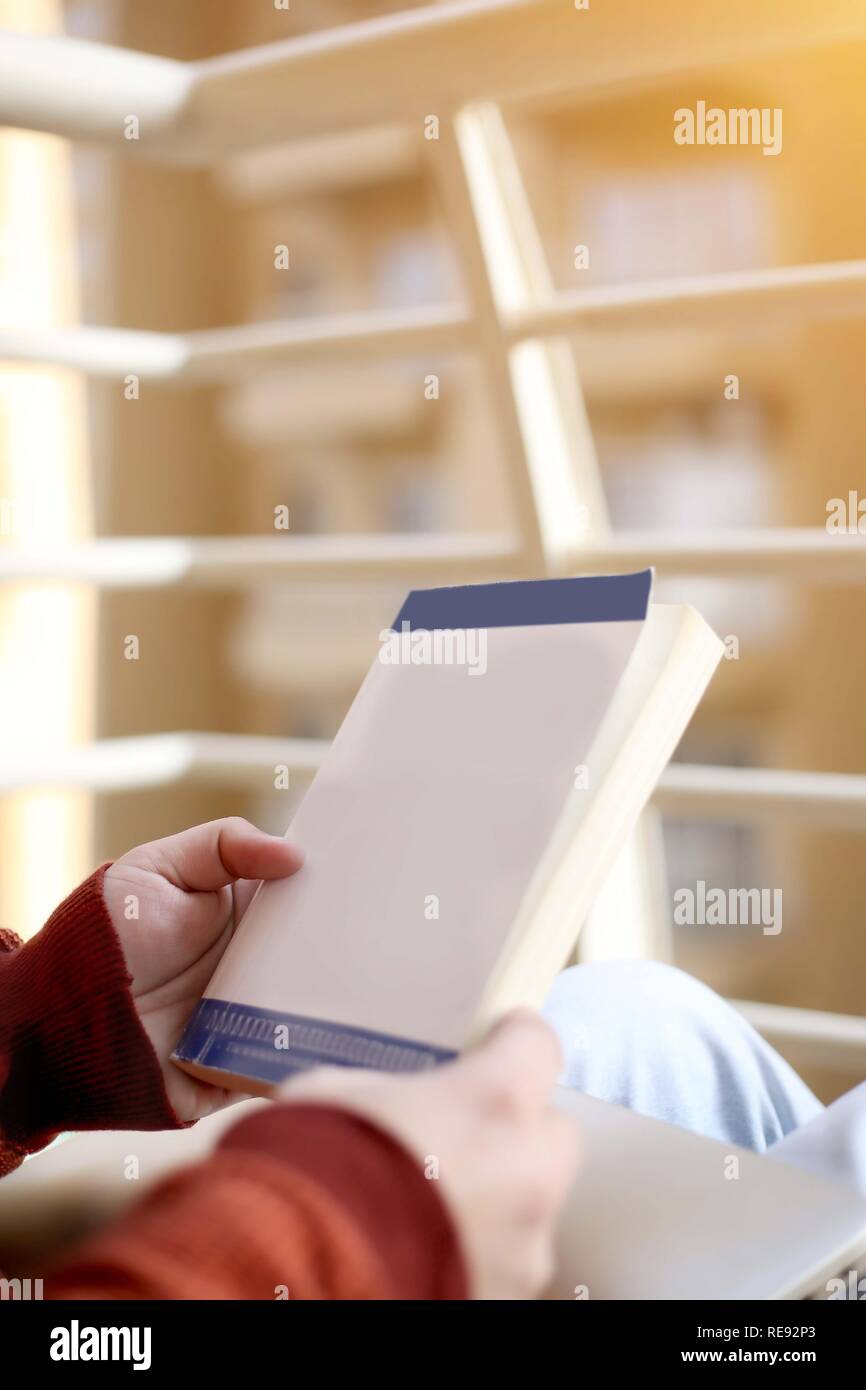 Adult man hand holding book hi-res stock photography and images - Alamy