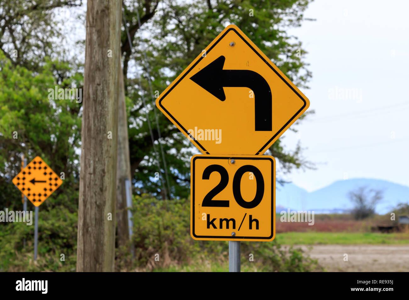 Road traffic sign, bend ahead hi-res stock photography and images - Alamy