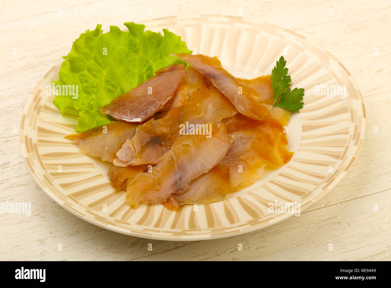 Smoked catfish fillet carpaccio Stock Photo - Alamy