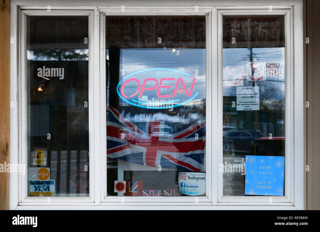 A OPEN store window that shows the English flag, english products ...
