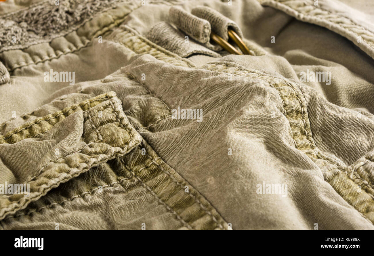 clothing items washed cotton fabric texture with seams, macro, close-up ...