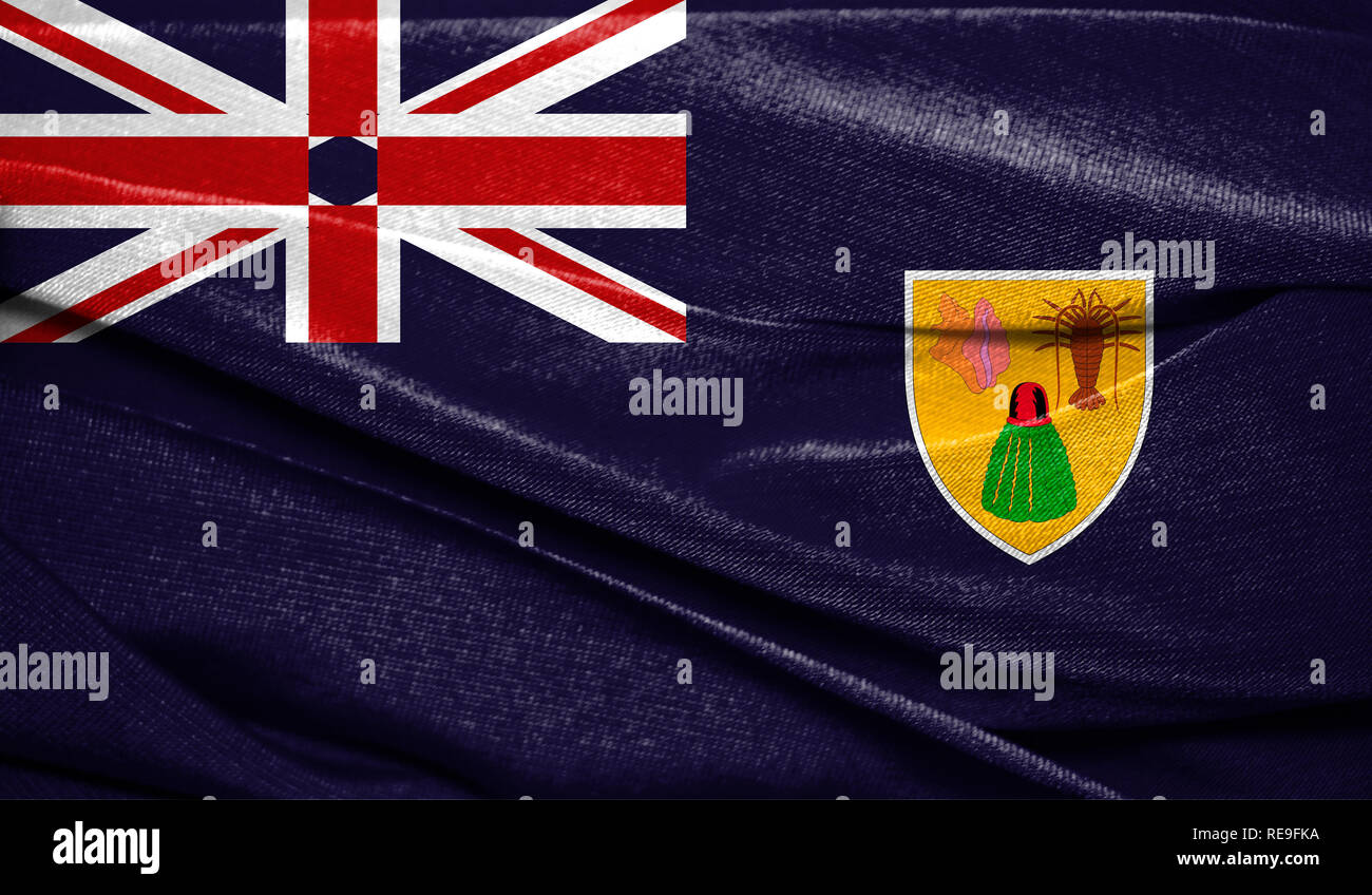 Realistic flag of Turks and Caicos Islands on the wavy surface of ...